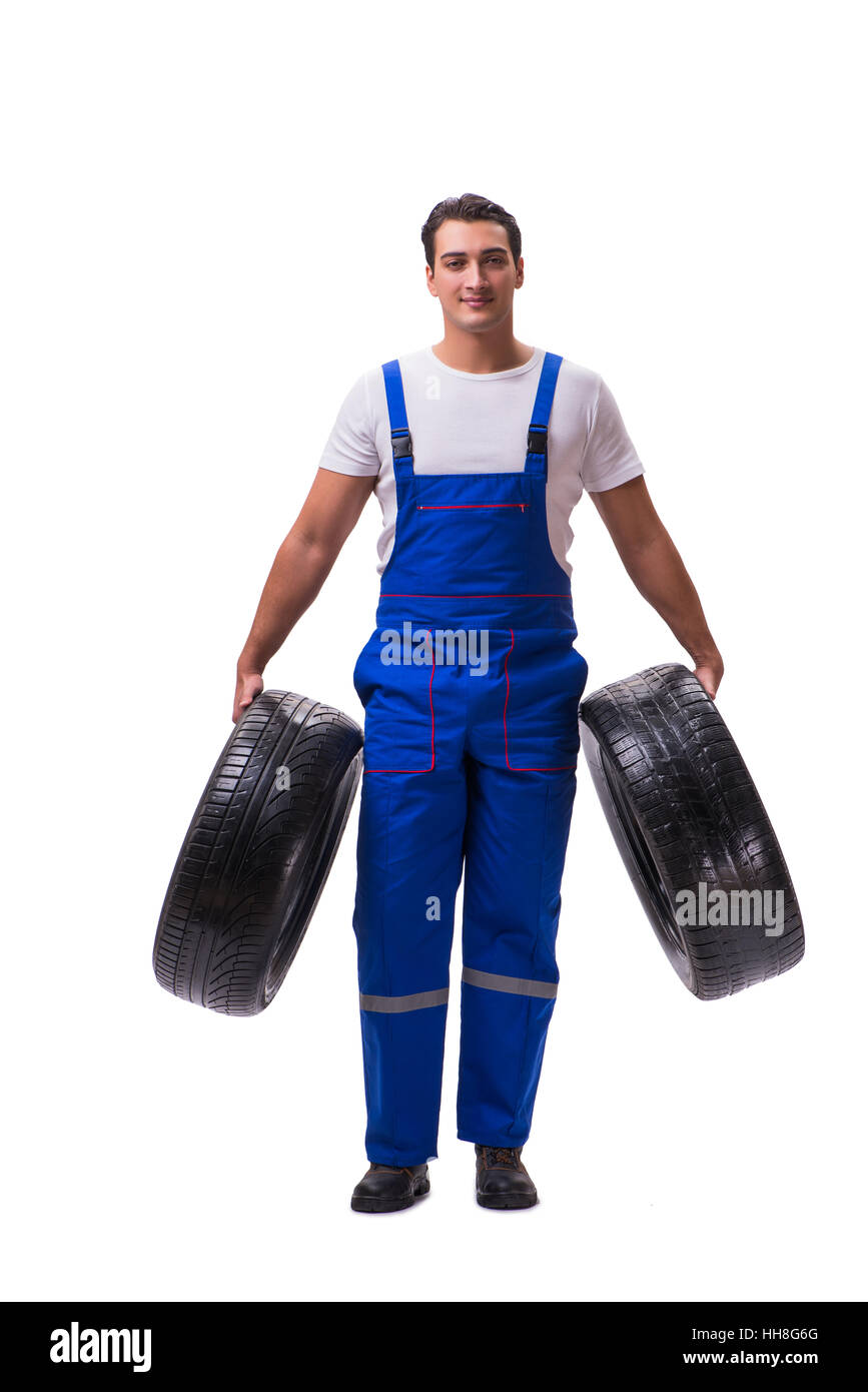 Handsome tyre repairman isolated on white Stock Photo - Alamy
