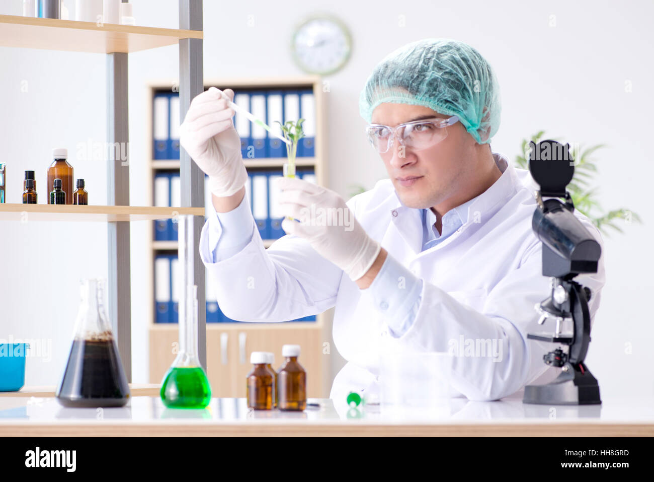 Biotechnology concept with scientist in lab Stock Photo - Alamy