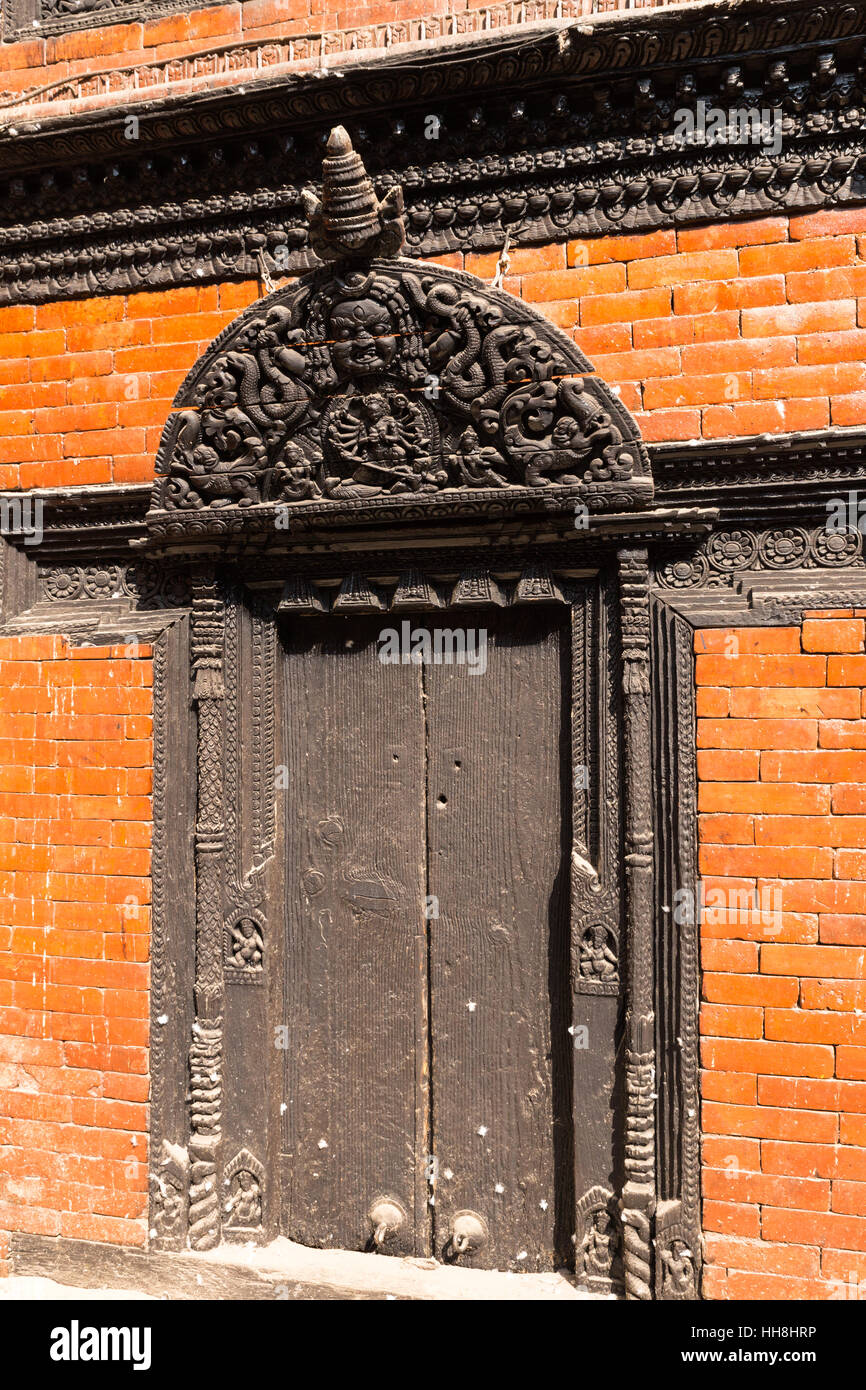 Antique carved wooden gate Courtyard of Kumari Bahal in Kathmandu ...