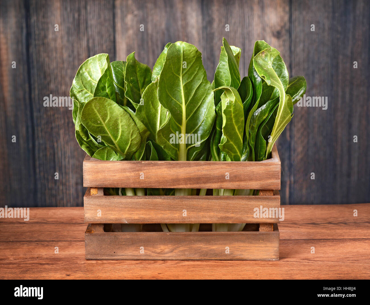 bunches of fresh chard on the wood table Stock Photo - Alamy