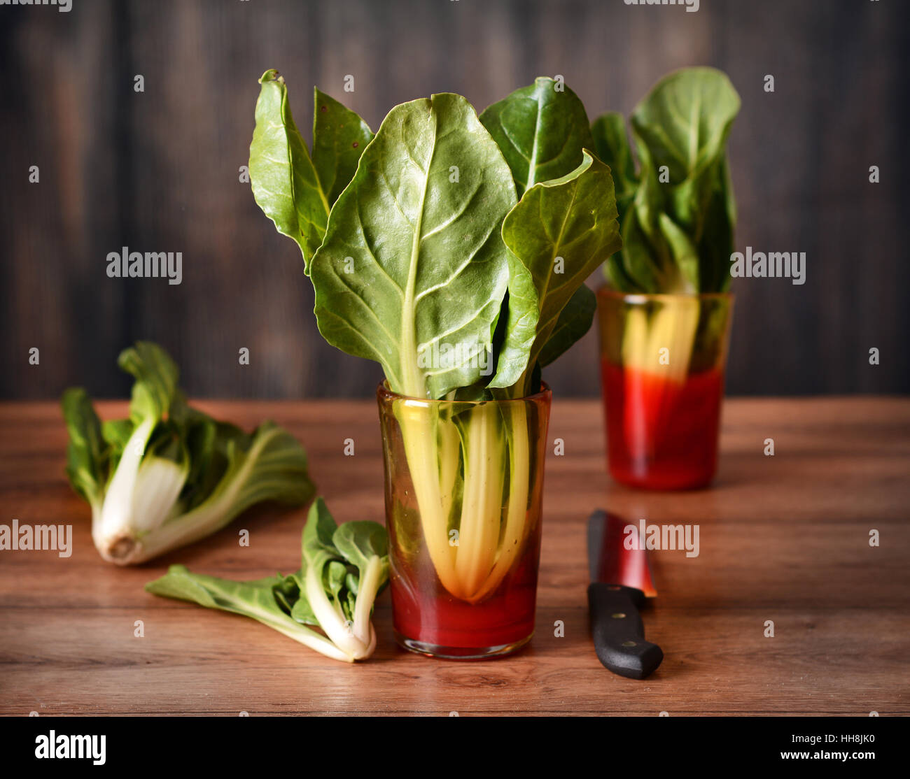 bunches of fresh chard on the wood table Stock Photo - Alamy