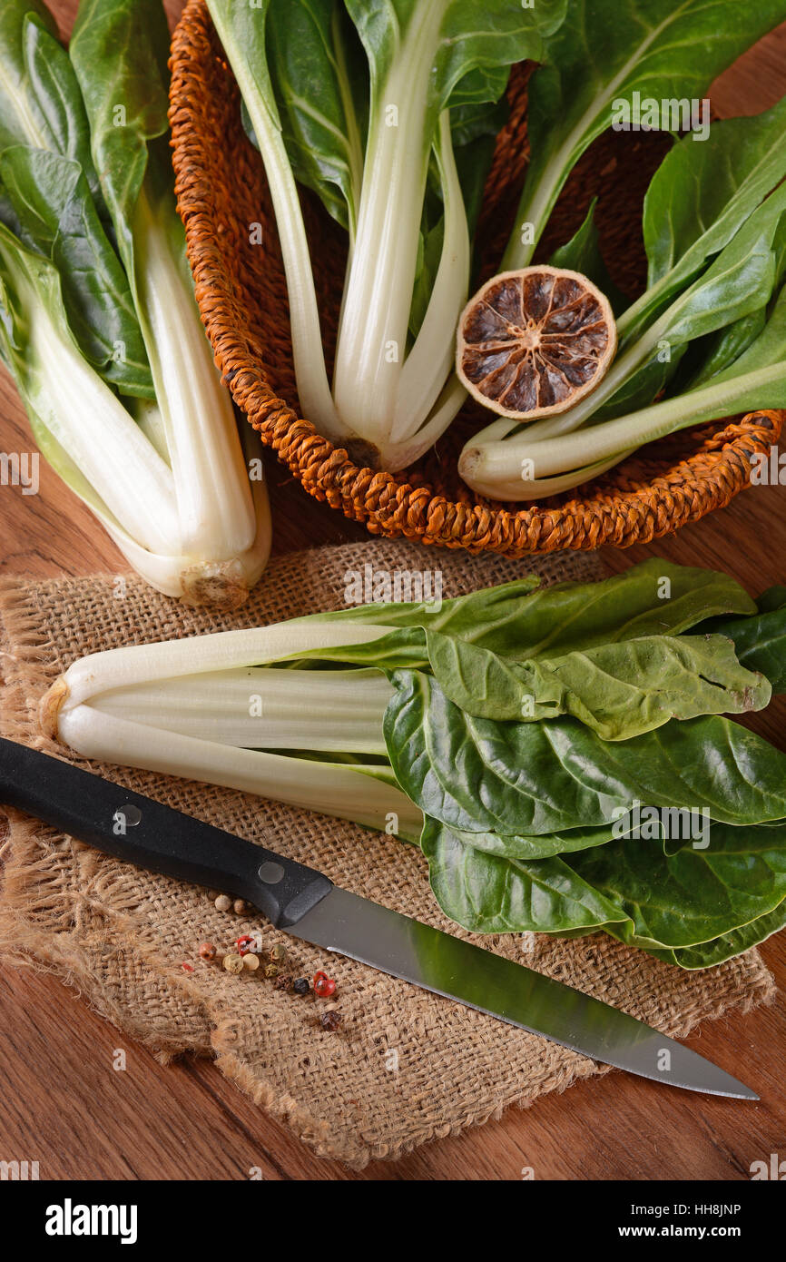 bunches of fresh chard on the wood table Stock Photo - Alamy