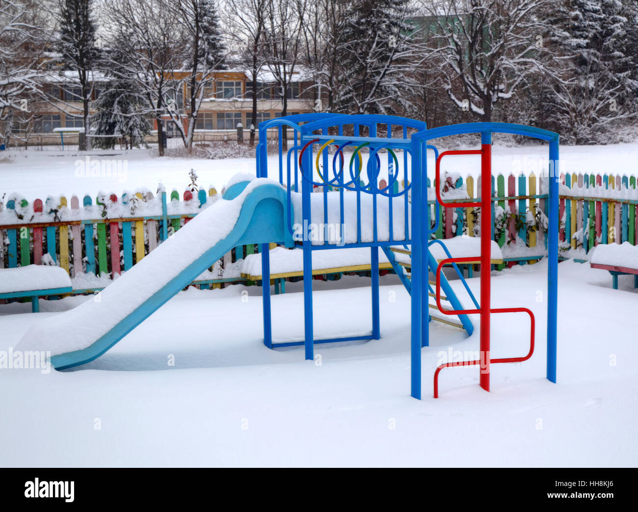 Children's playground covered with snow in winter Stock Photo - Alamy