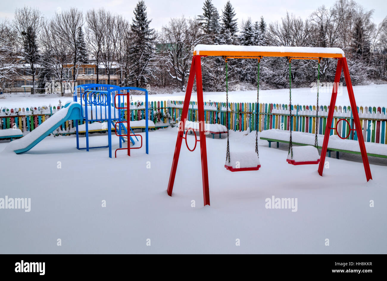 Children's playground covered with snow in winter Stock Photo - Alamy