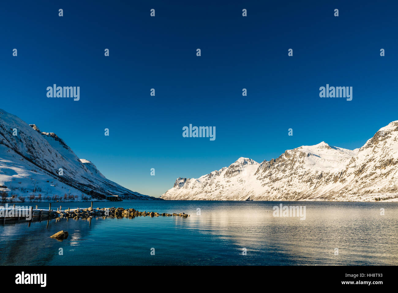 Norwegian fjords and snowy mountains in winter Stock Photo - Alamy