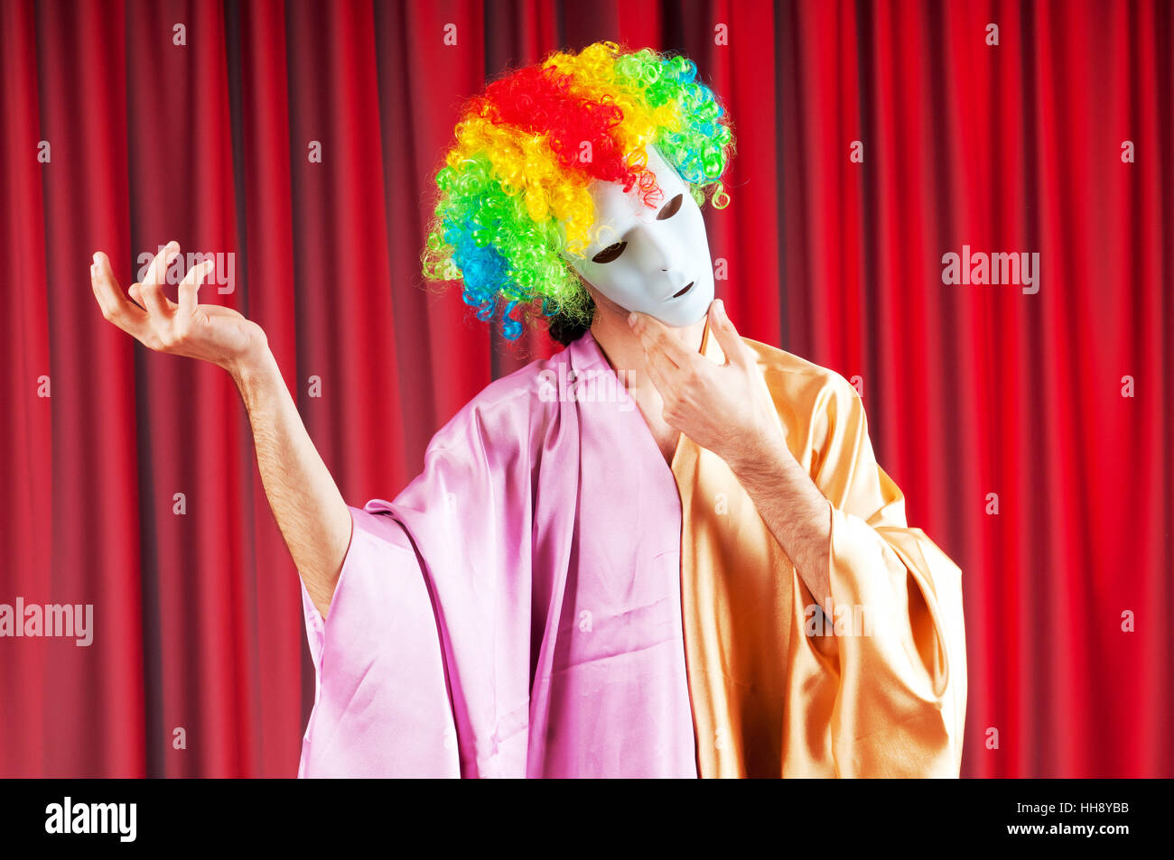 Theater concept with masked actor Stock Photo - Alamy