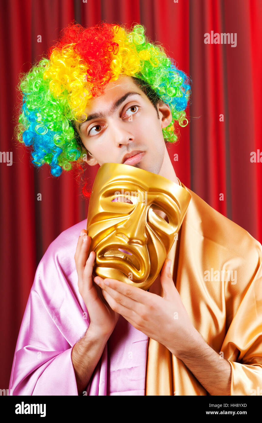 Theater concept with masked actor Stock Photo - Alamy