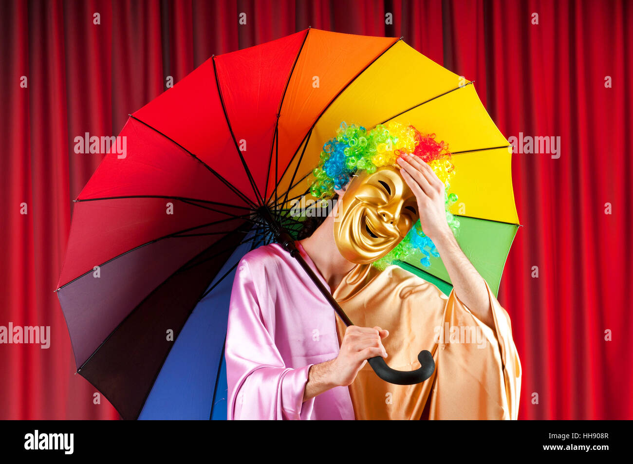 Theater concept with masked actor Stock Photo - Alamy