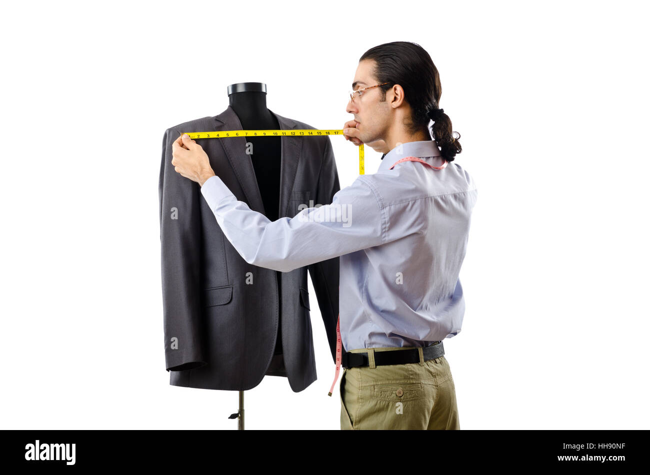 Man being measured for suit hi-res stock photography and images - Alamy