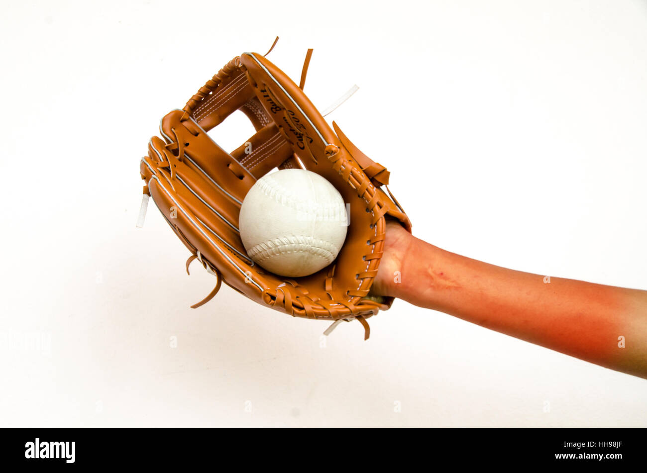 injury hand of children catching the ball on white background Stock ...