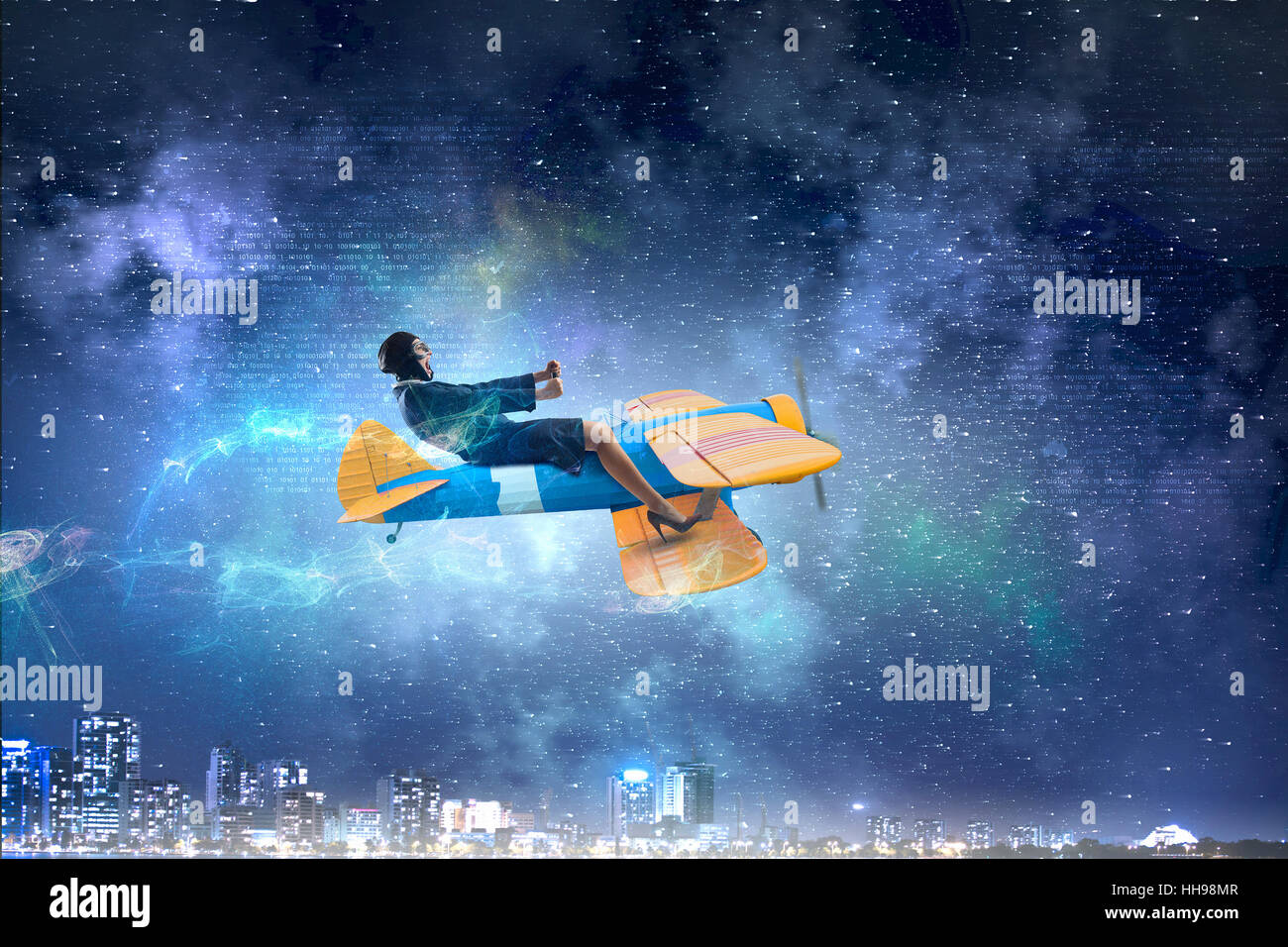 Woman pilot in helmet flying hi-res stock photography and images - Alamy