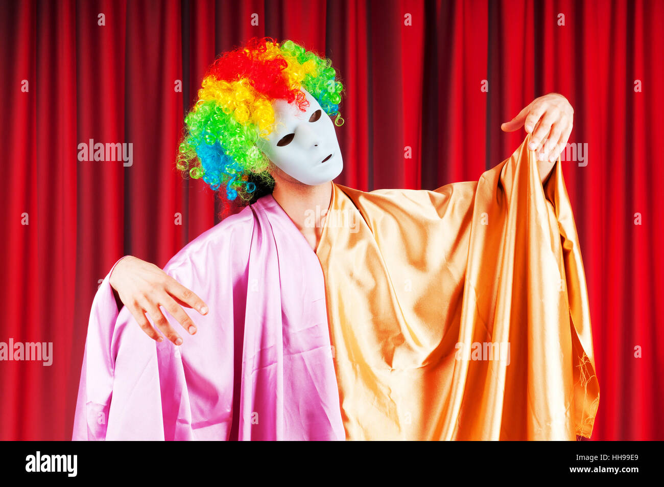 Theater concept with masked actor Stock Photo - Alamy