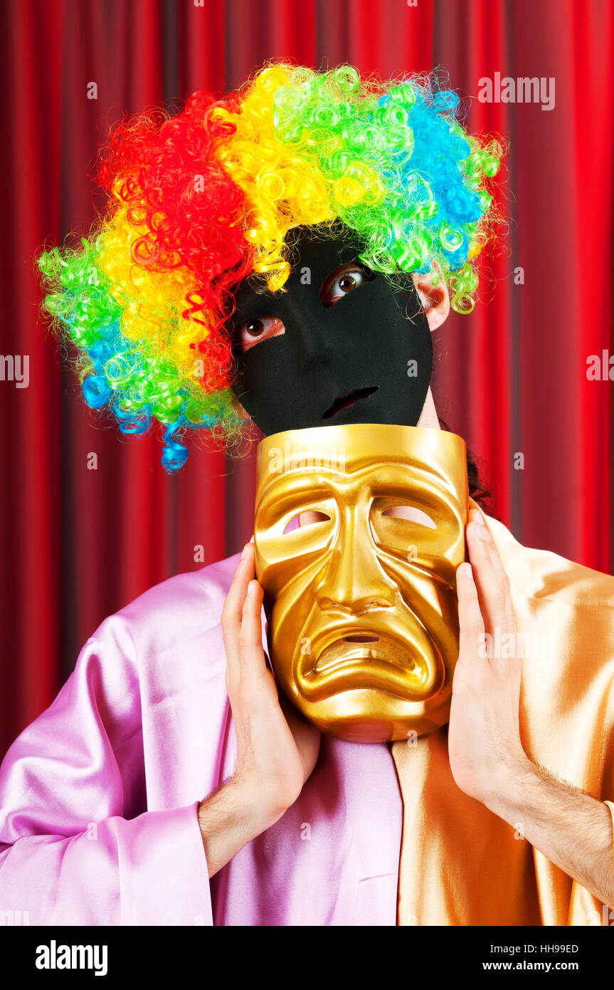 Theater concept with masked actor Stock Photo - Alamy
