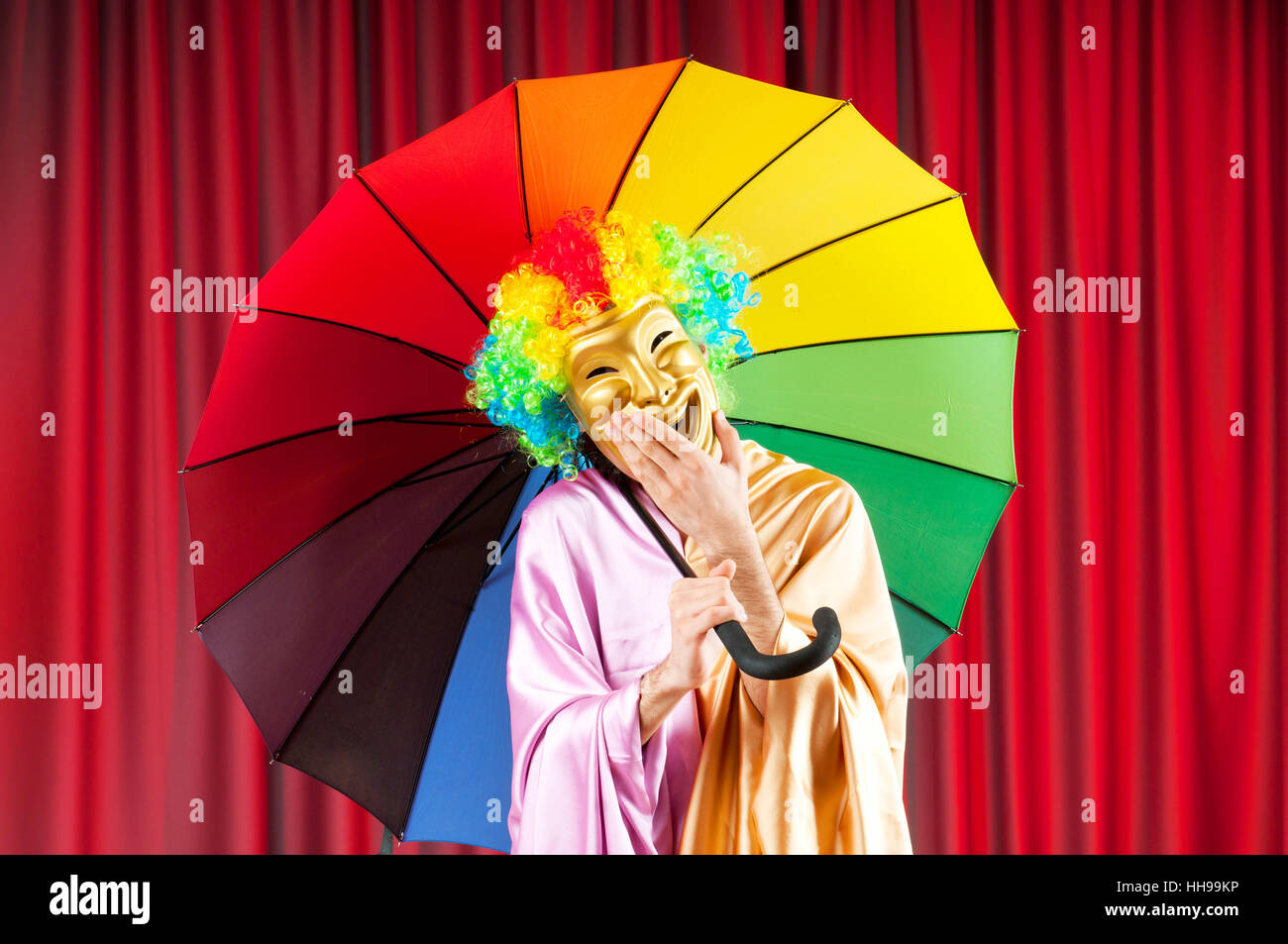 Theater concept with masked actor Stock Photo - Alamy