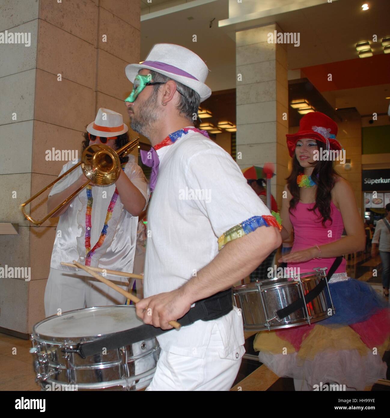 Male trombonist and trumpet playerat the Kentpark Shopping Mall during ...