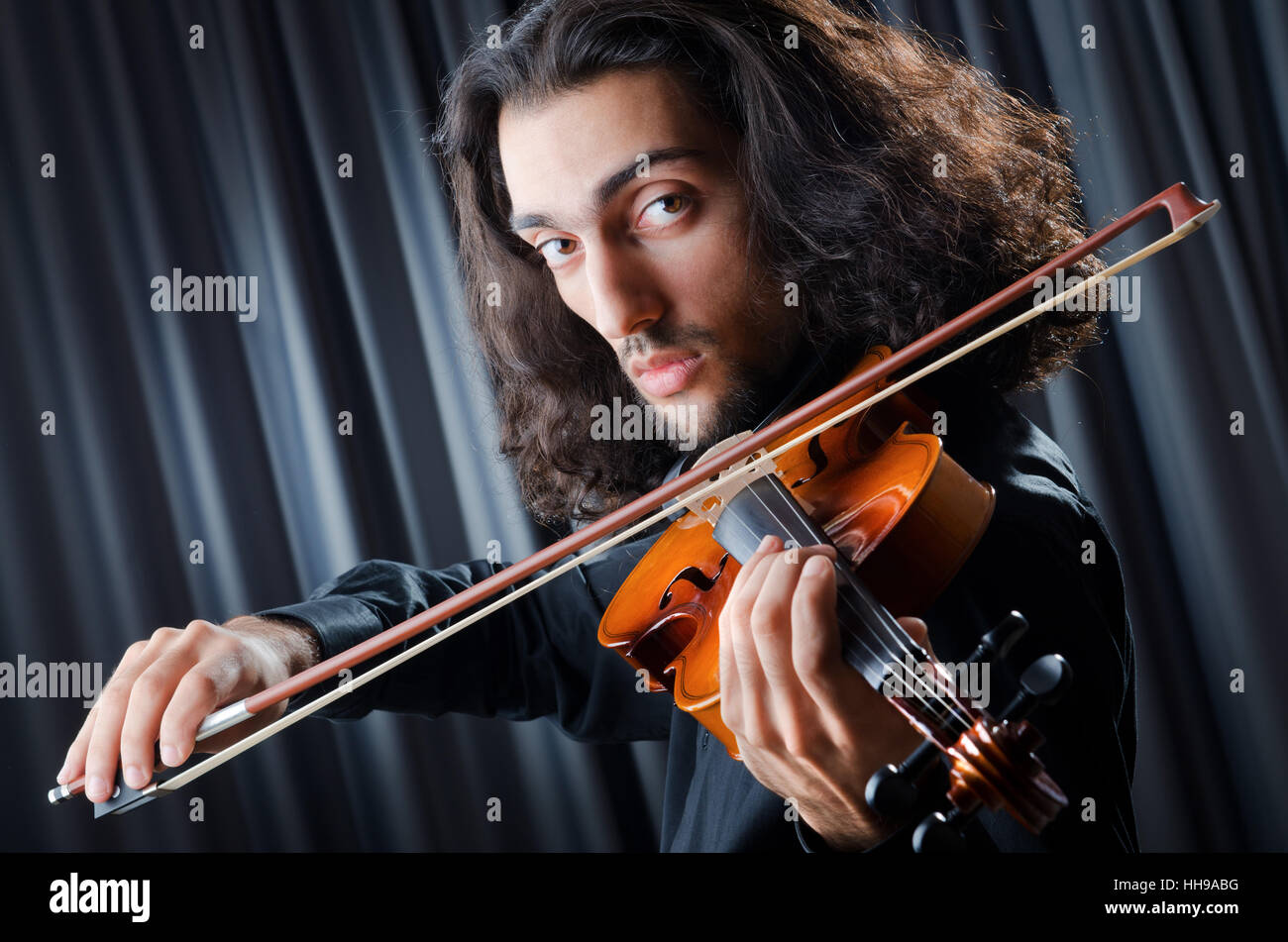 Violin player playing the intstrument Stock Photo - Alamy
