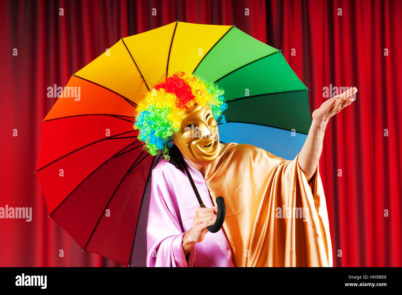 Theater concept with masked actor Stock Photo - Alamy