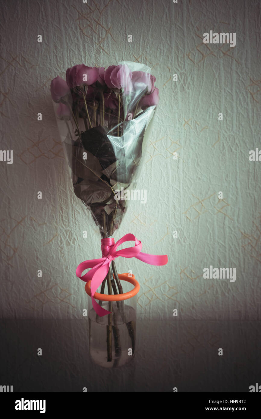 Pink rose peony bouquet with pink ribbon in a vase with water Stock ...