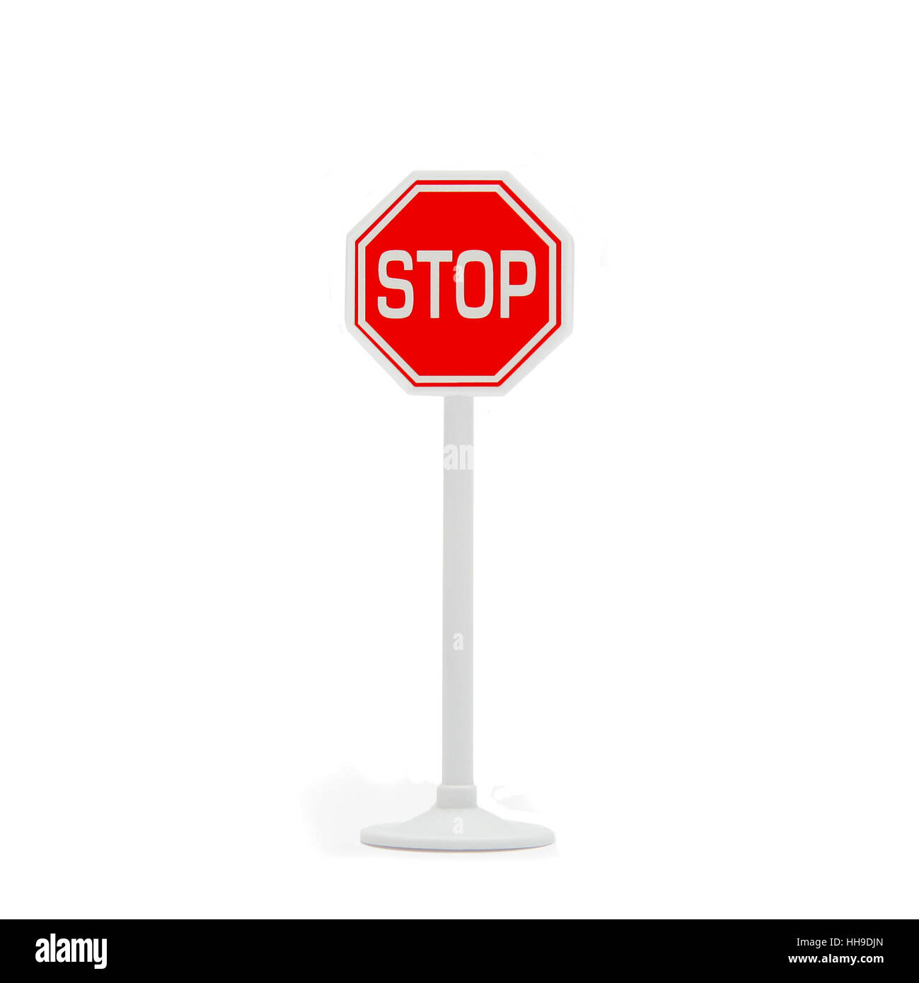 Stop sign post on white isolated background Stock Photo - Alamy