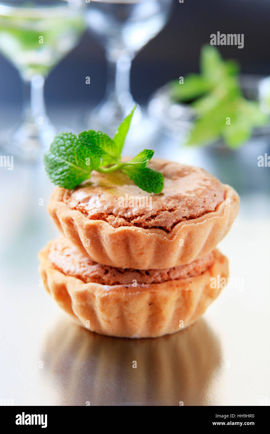 Sweet tartlets with nut and marzipan filling Stock Photo - Alamy
