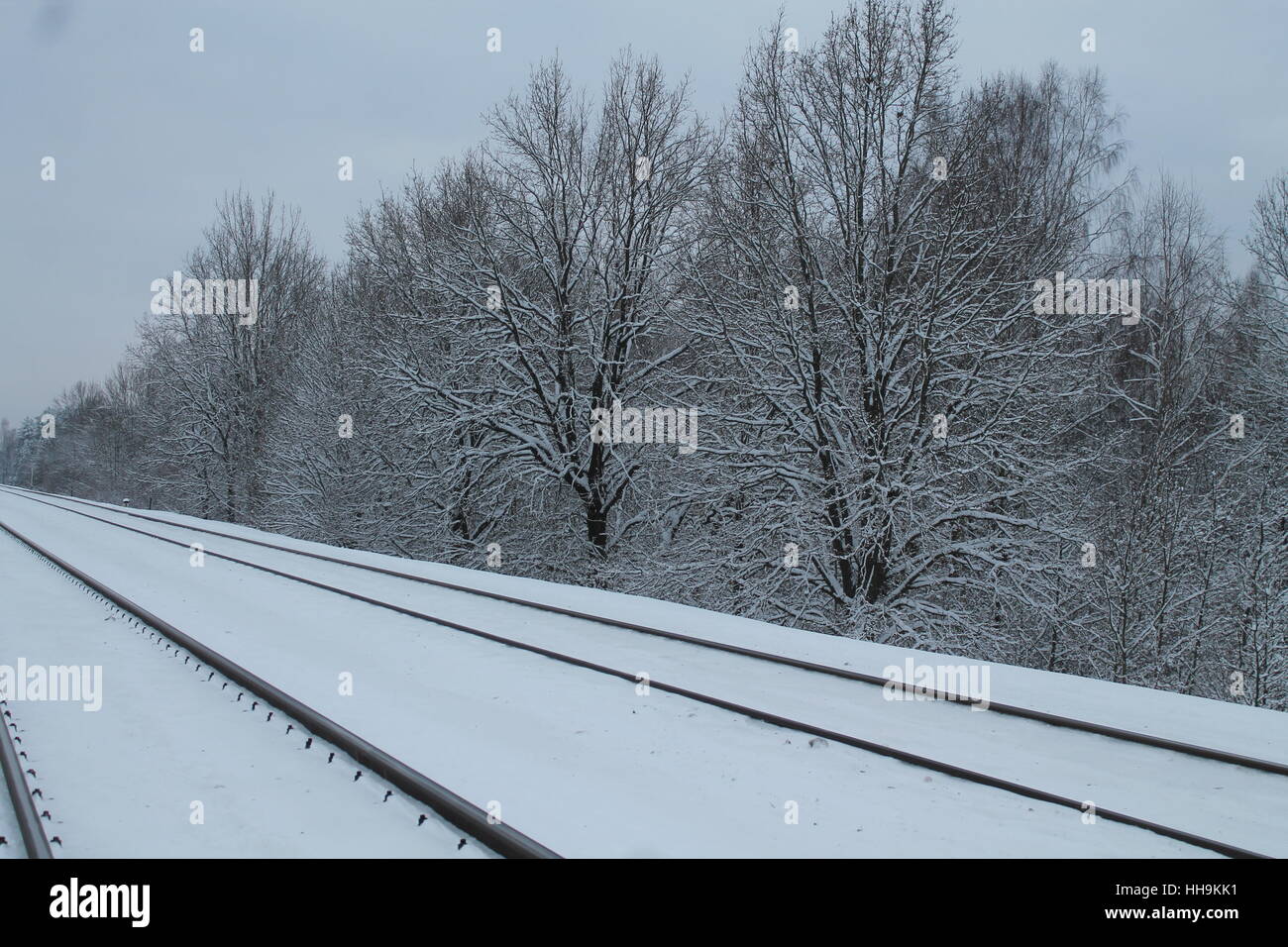 way on the railway lines covered deep layers of snow with beautiful in ...