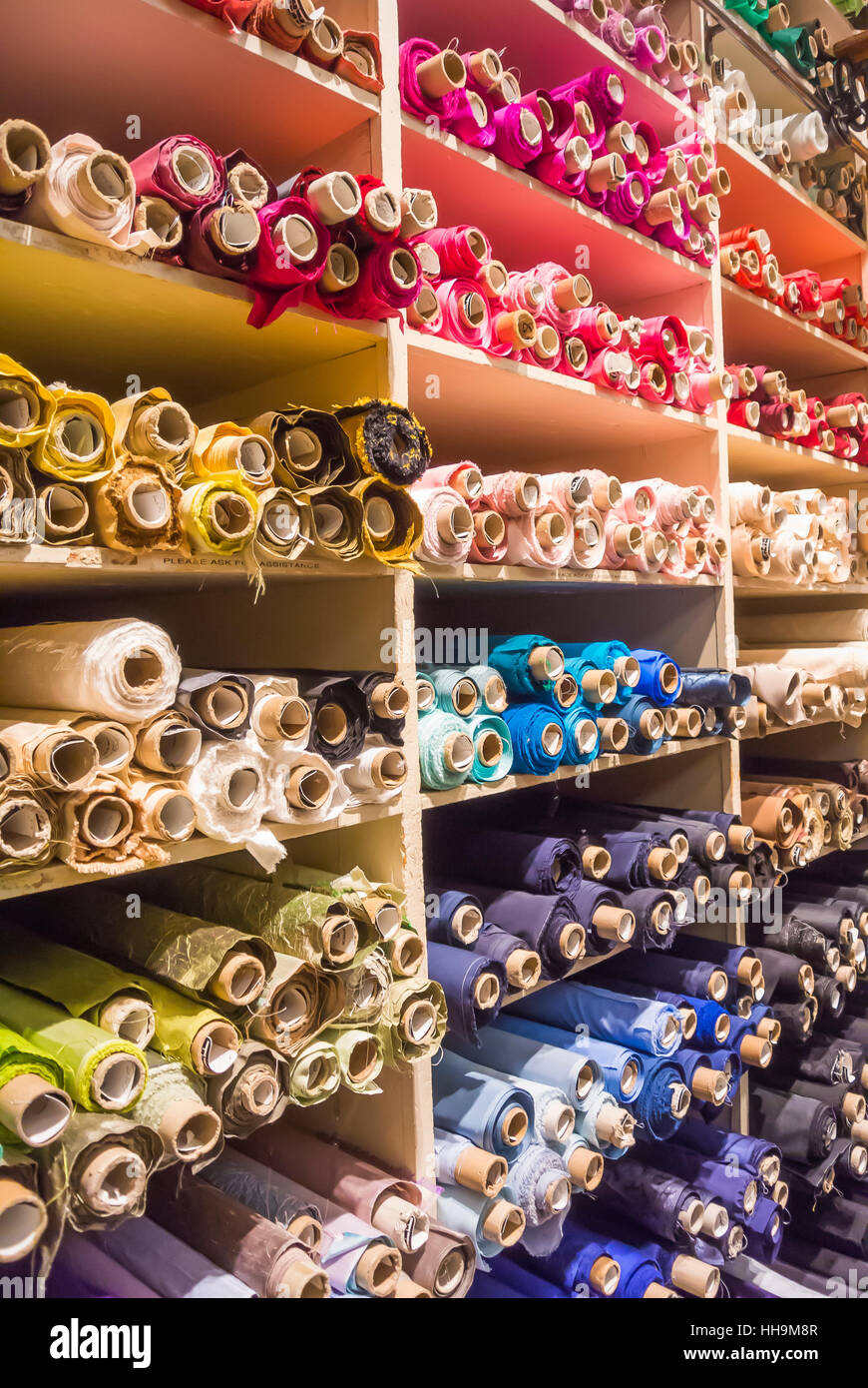 Rolls of Material on Display in Fabric Store Stock Photo - Alamy