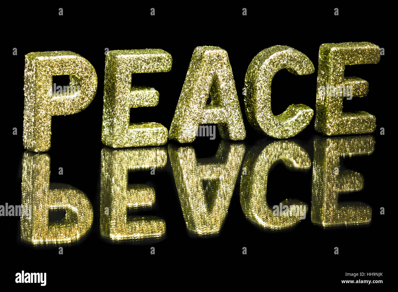 Gold glitter letter peace hi-res stock photography and images - Alamy