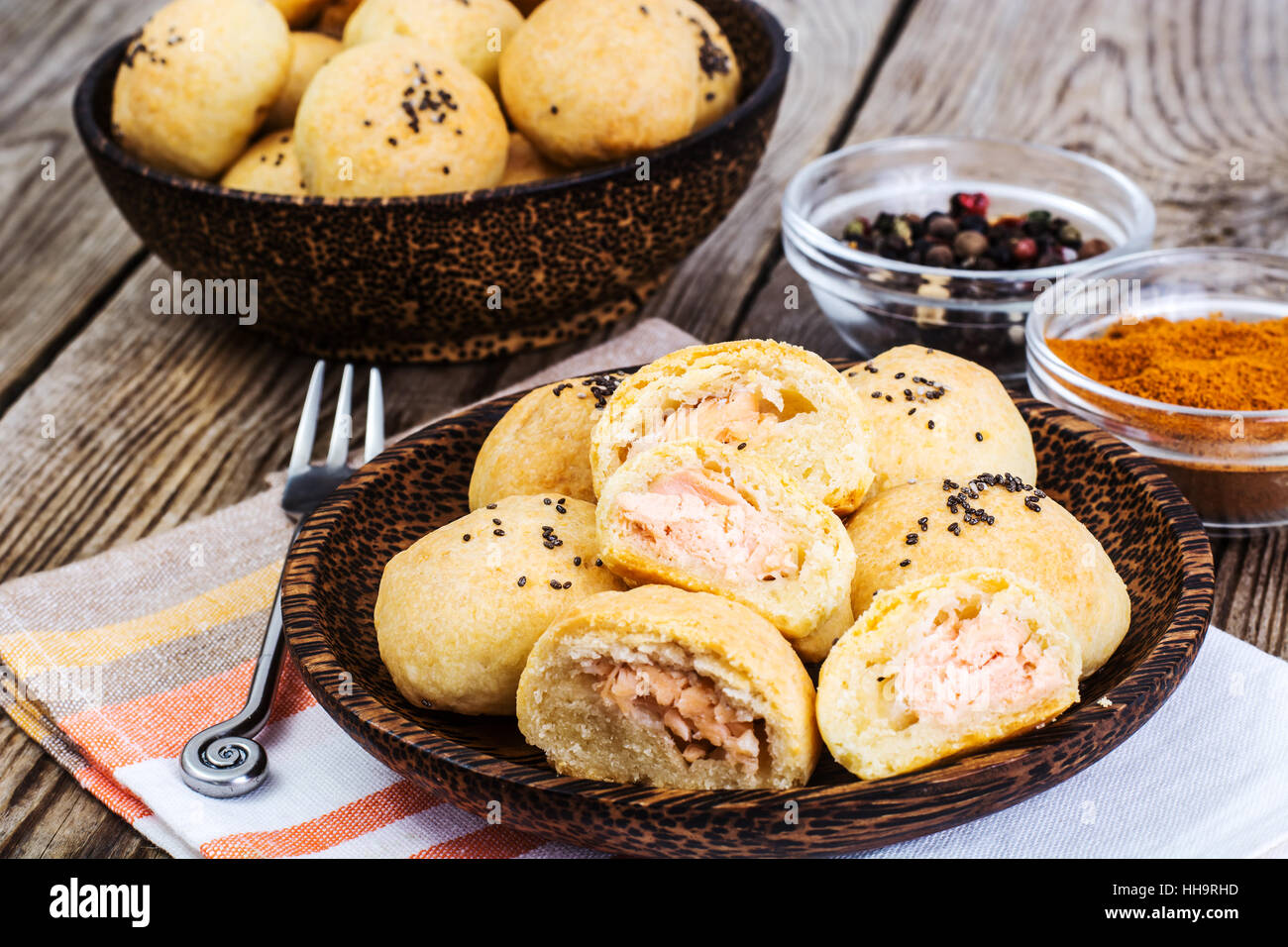 Small cakes with fish and chia seeds Stock Photo - Alamy