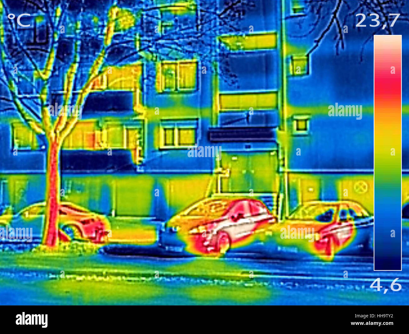 Thermal image showing parked cars in front of the apartment building ...