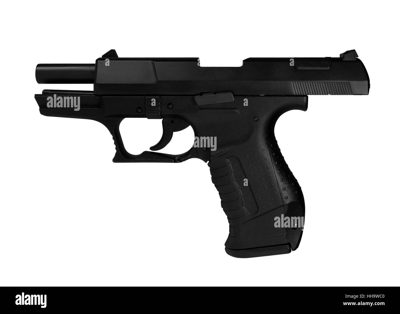 sideways studio photography of a black pistol in white back Stock Photo ...