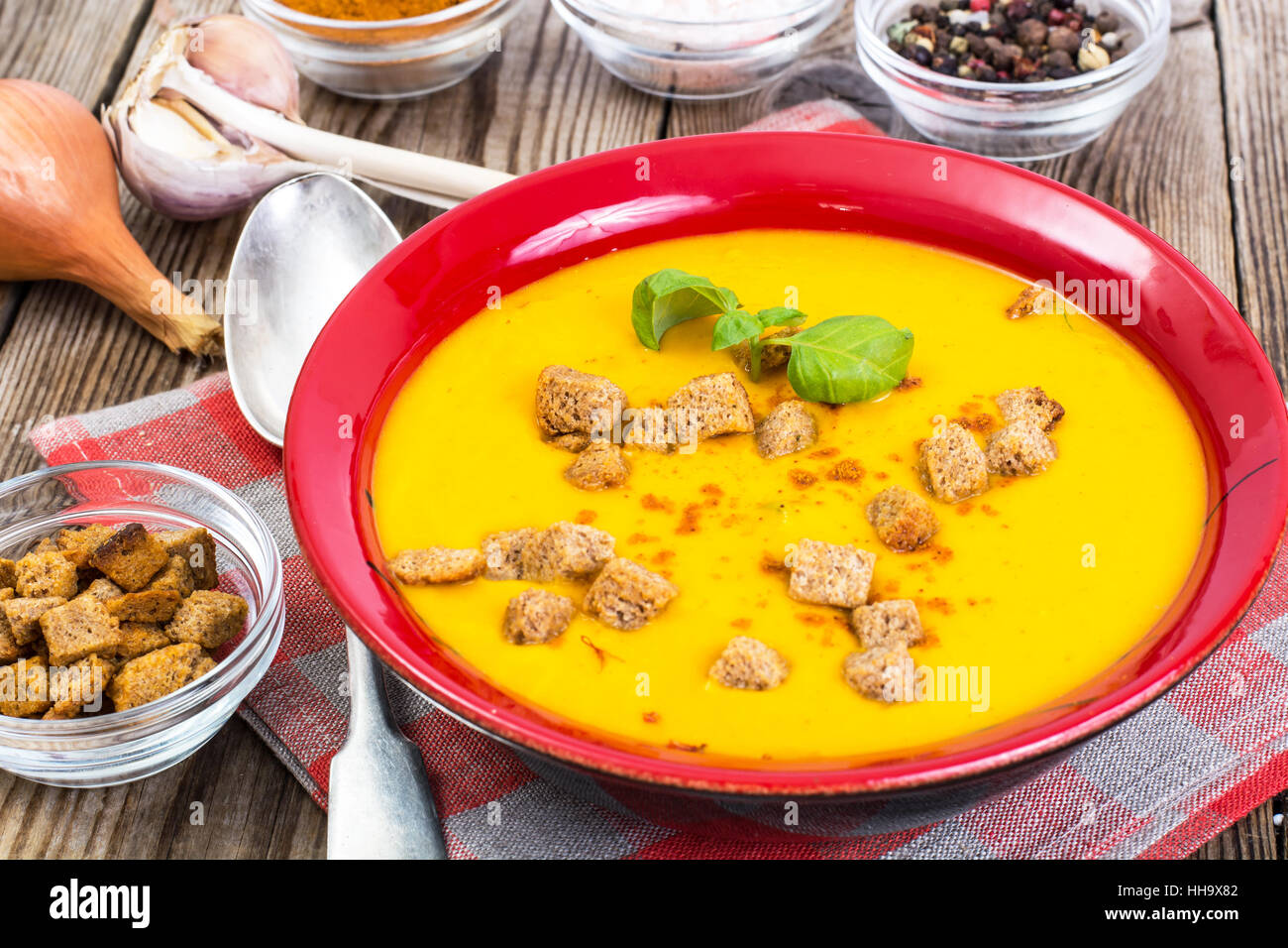 Spiced carrot puree with croutons Stock Photo - Alamy