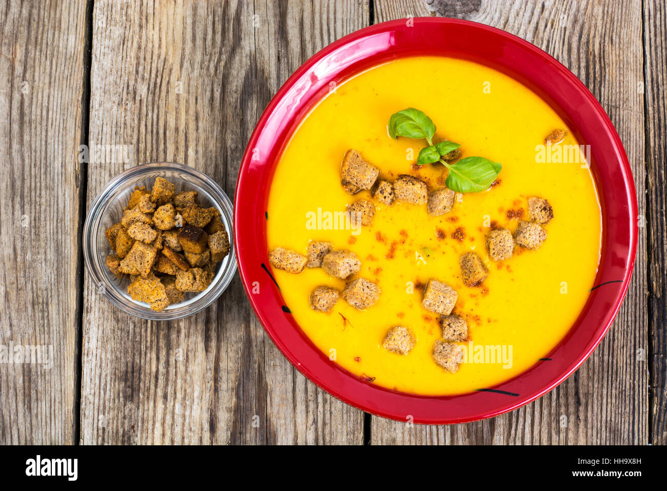 Spiced carrot puree with croutons Stock Photo - Alamy