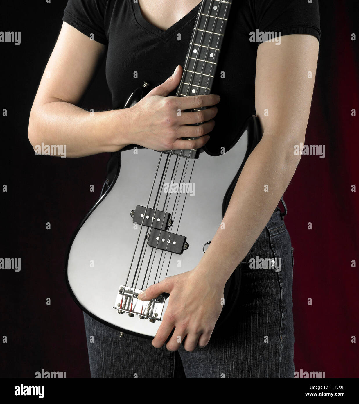 woman with bass guitar Stock Photo - Alamy