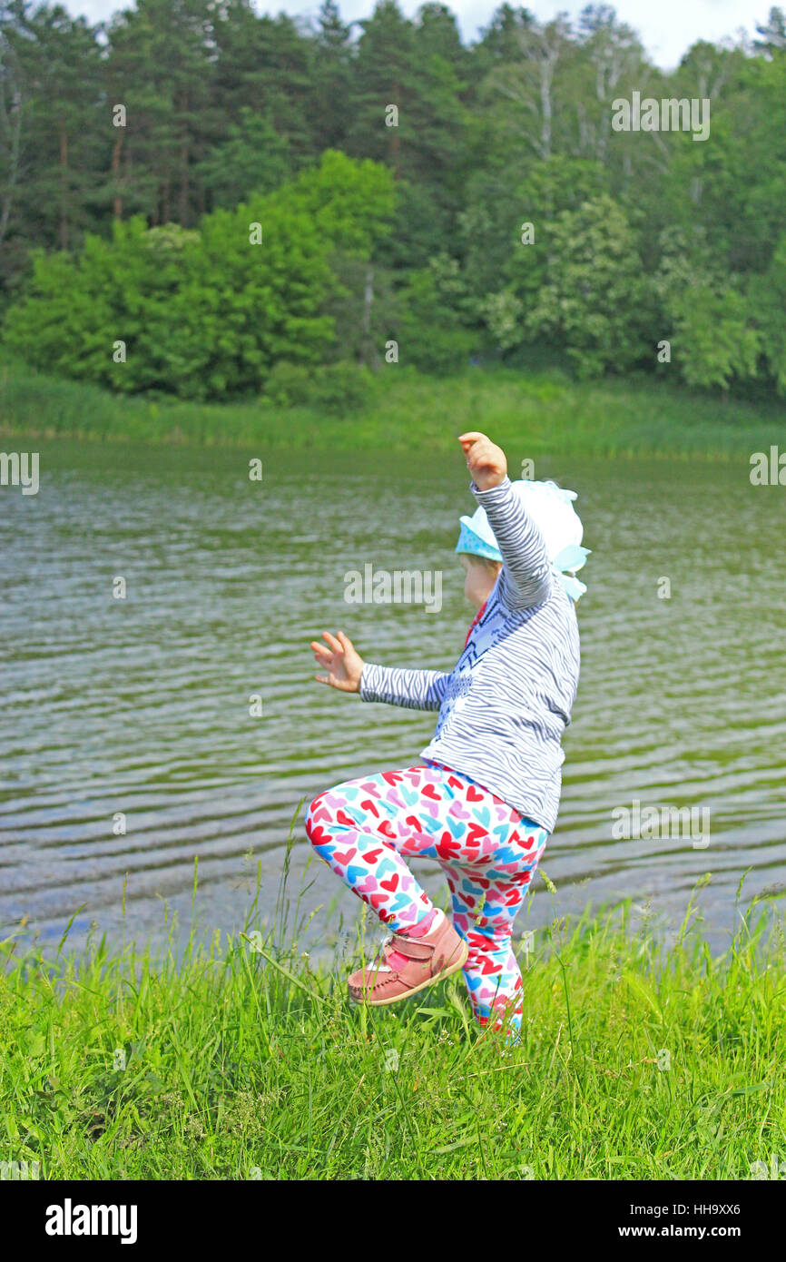 baby falls down to the river at the forest Stock Photo - Alamy