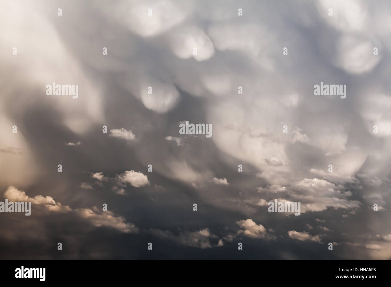 Strange dramatic mammatus clouds of bubble shapes formed after a storm ...