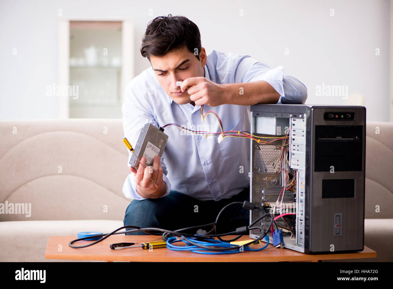 Frustrated man with broken pc computer Stock Photo - Alamy