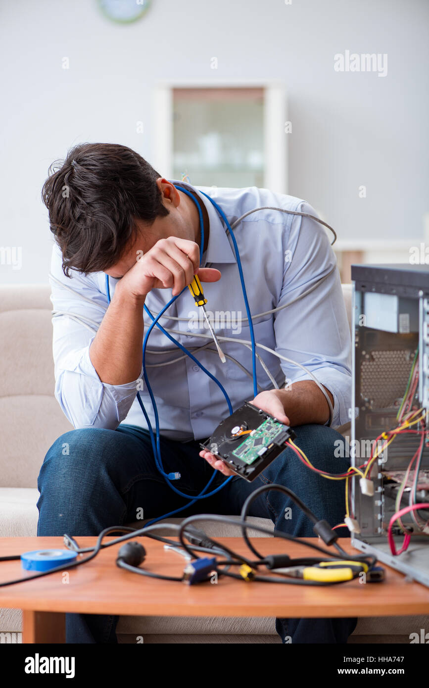 Frustrated man with broken pc computer Stock Photo - Alamy