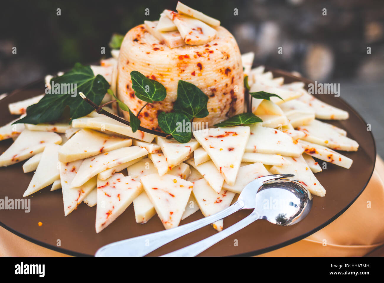 Traditional italian appetizer plate with hot cheese Stock Photo - Alamy