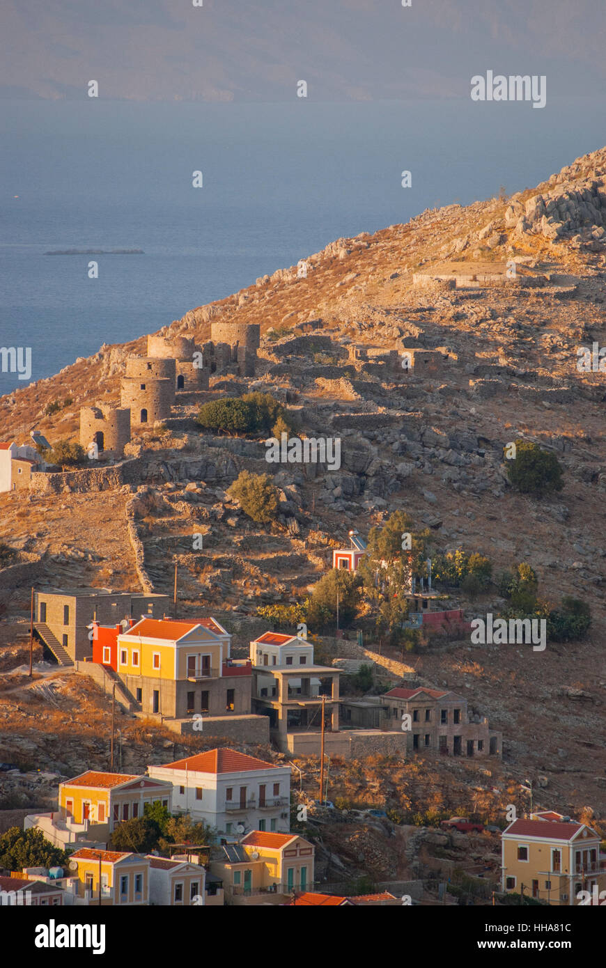 The old windmills on the ridge above horio on the island of Symi greece ...