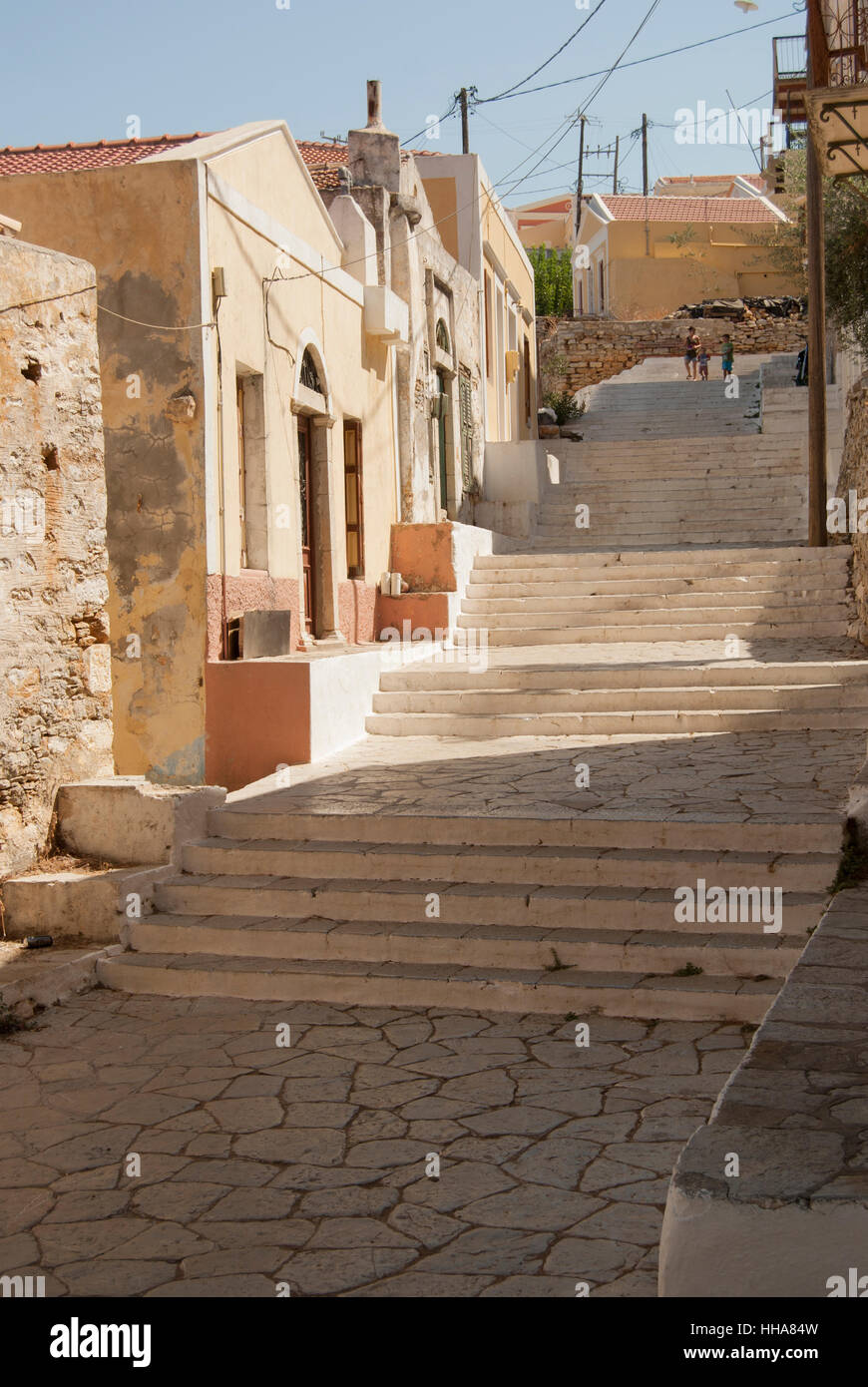 Looking up the kalistrata towards horio on the island of symi greece ...