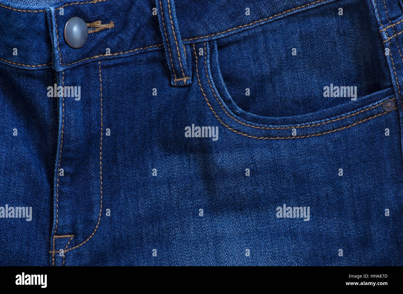 Classic blue jeans stitched brown thread Stock Photo - Alamy