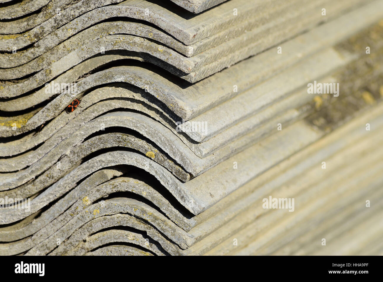 Folded neatly in a pile of old slate. Background of slate. Old building ...