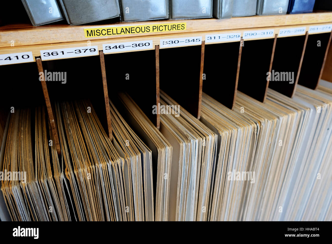 Library slots of photographs and art Stock Photo - Alamy