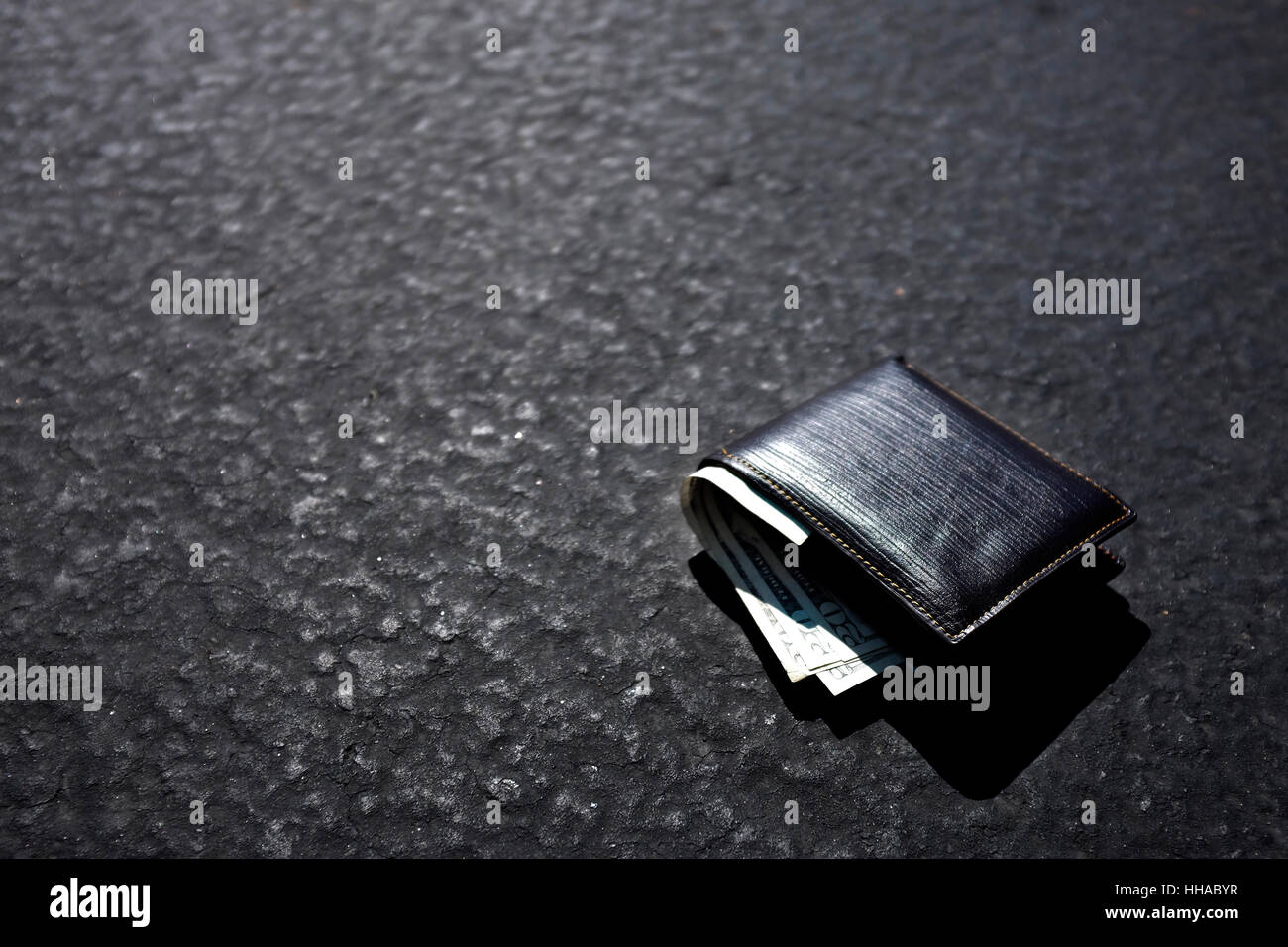 Lost wallet lying on street hi-res stock photography and images - Alamy