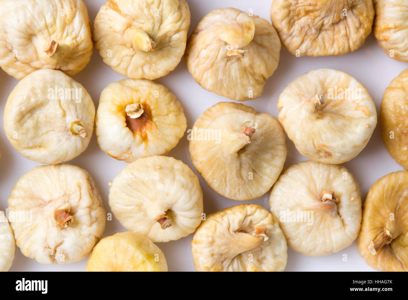 Bunch of dry figs forming a background Stock Photo - Alamy