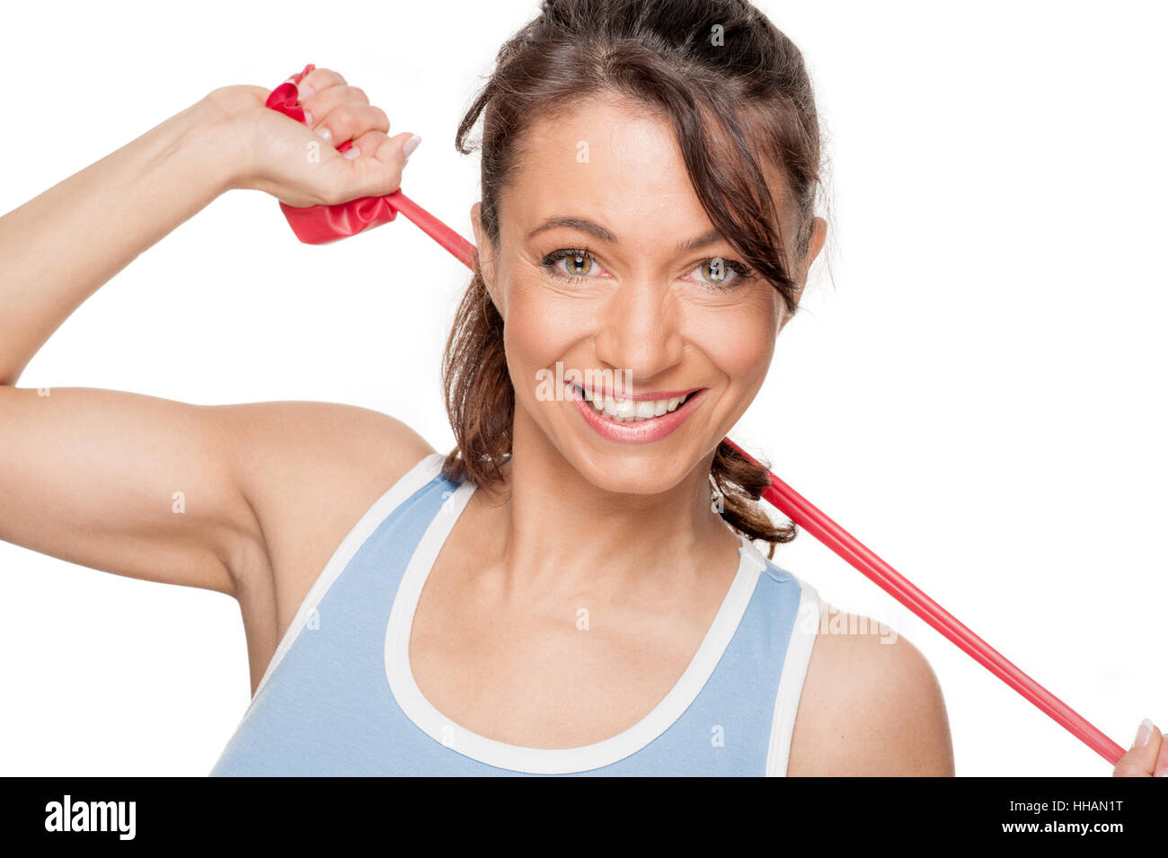 woman with red exercise band Stock Photo - Alamy