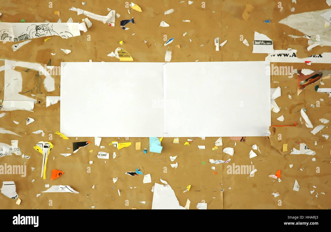 white paper and scraps paper on board Stock Photo - Alamy