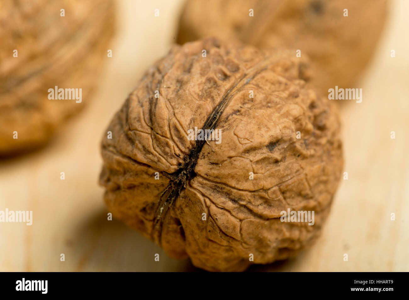 Nuts on a pine wood background. Artificial lighting with flax Stock ...
