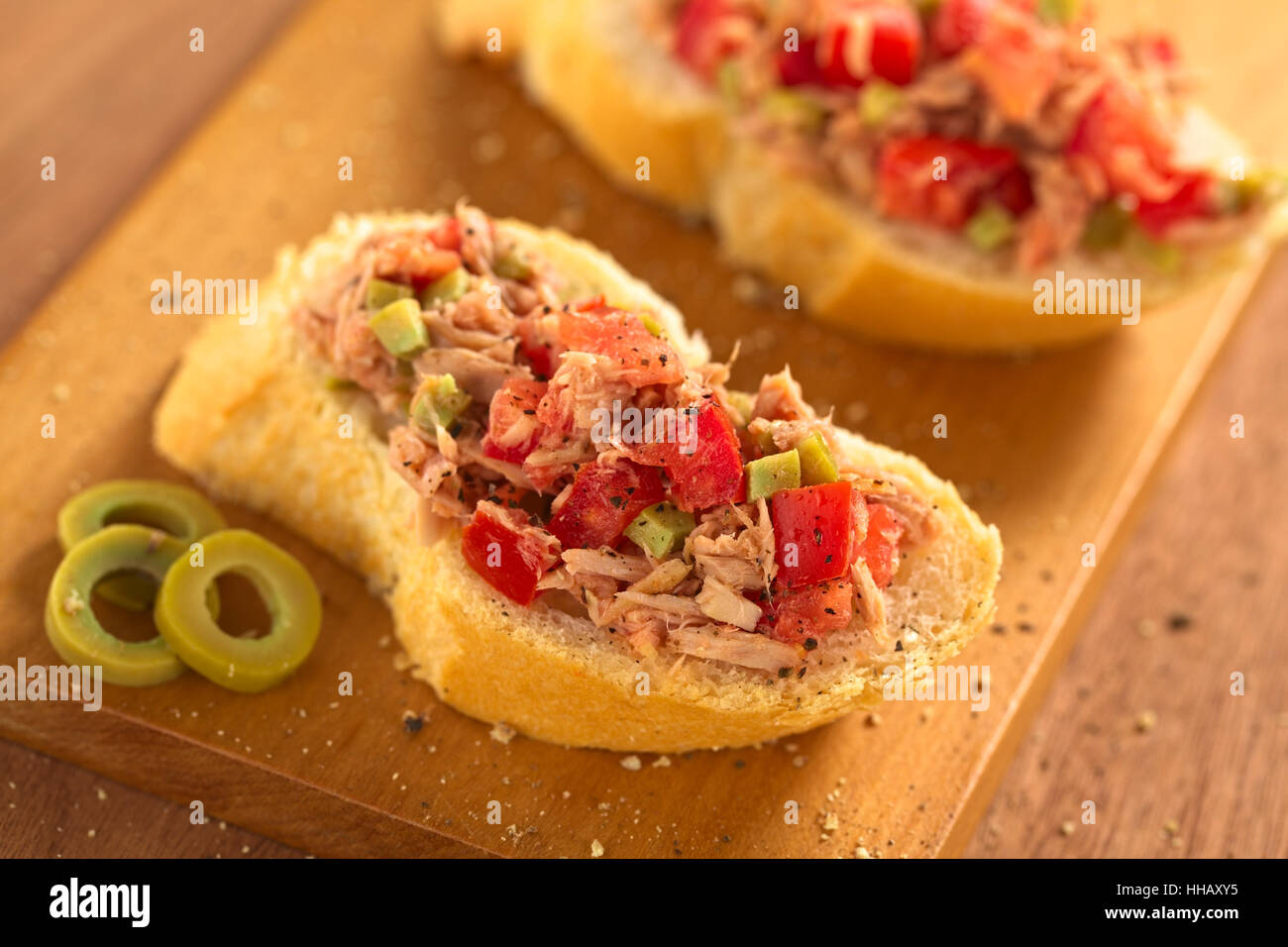 bread with tuna olive and tomato spread Stock Photo - Alamy
