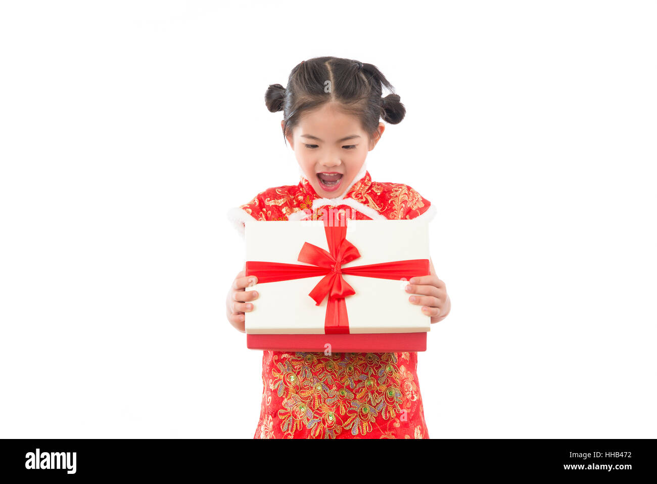 cute asian little girl in traditional chinese cheongsam and feel ...